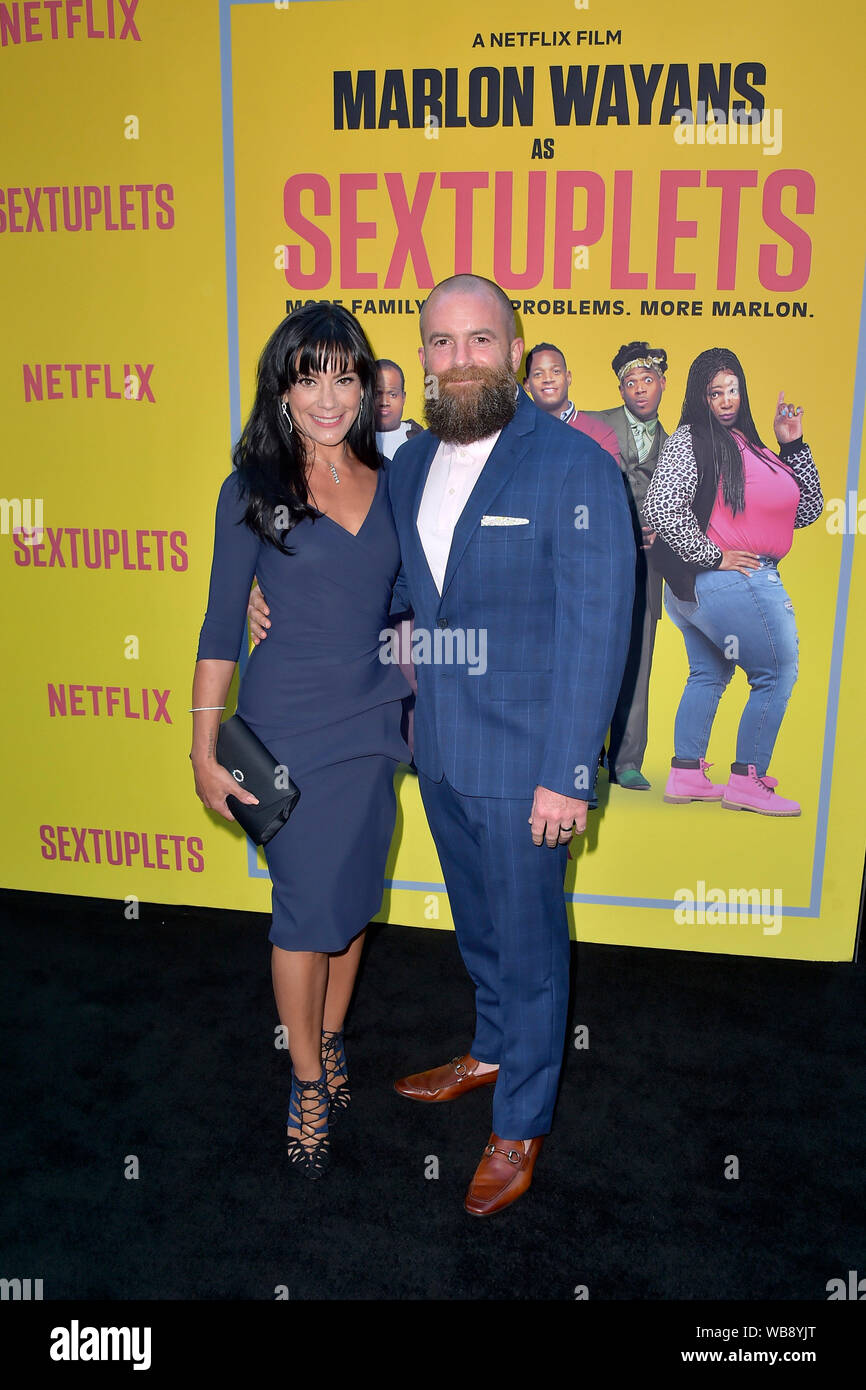 Michael Tiddes and guest attending the 'Sextuplets' premiere at ...