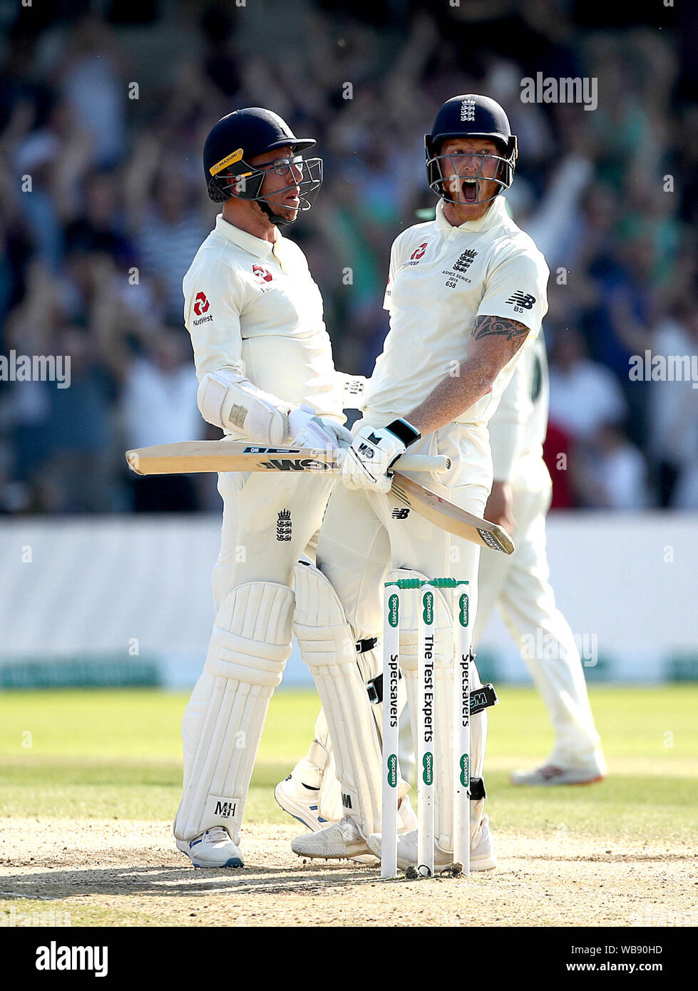 England's Ben Stokes celebrates victory with Jack Leach (left) during ...