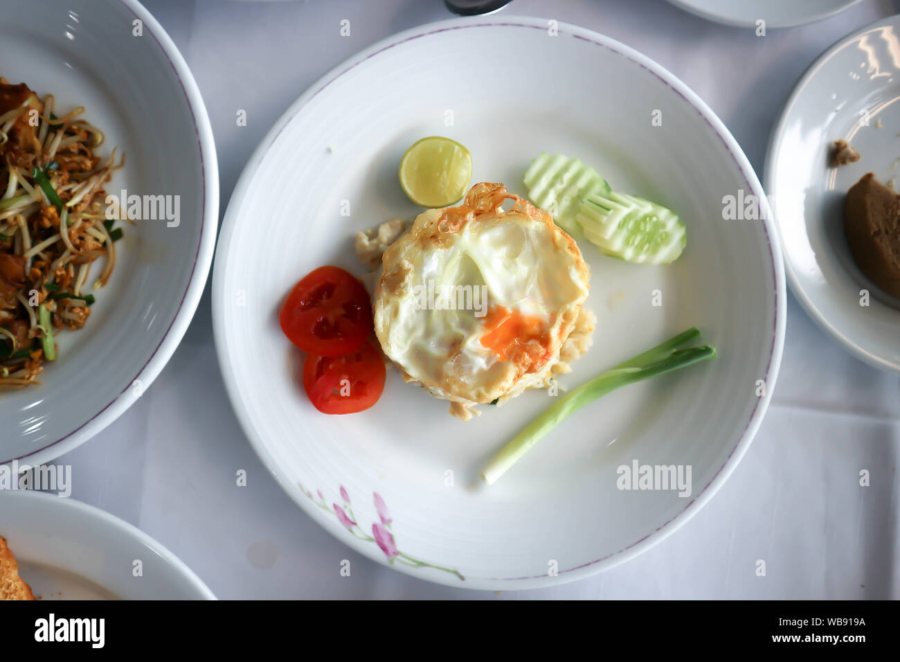 fried rice or stir-fried rice with fried egg and cucumber Stock Photo ...
