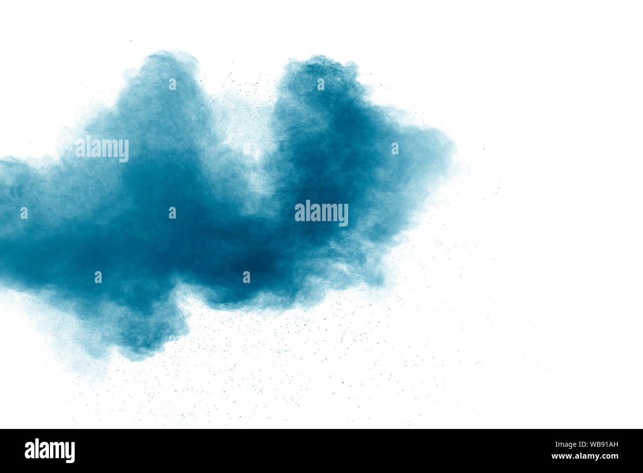 Bizarre forms of blue powder explode cloud on white background ...