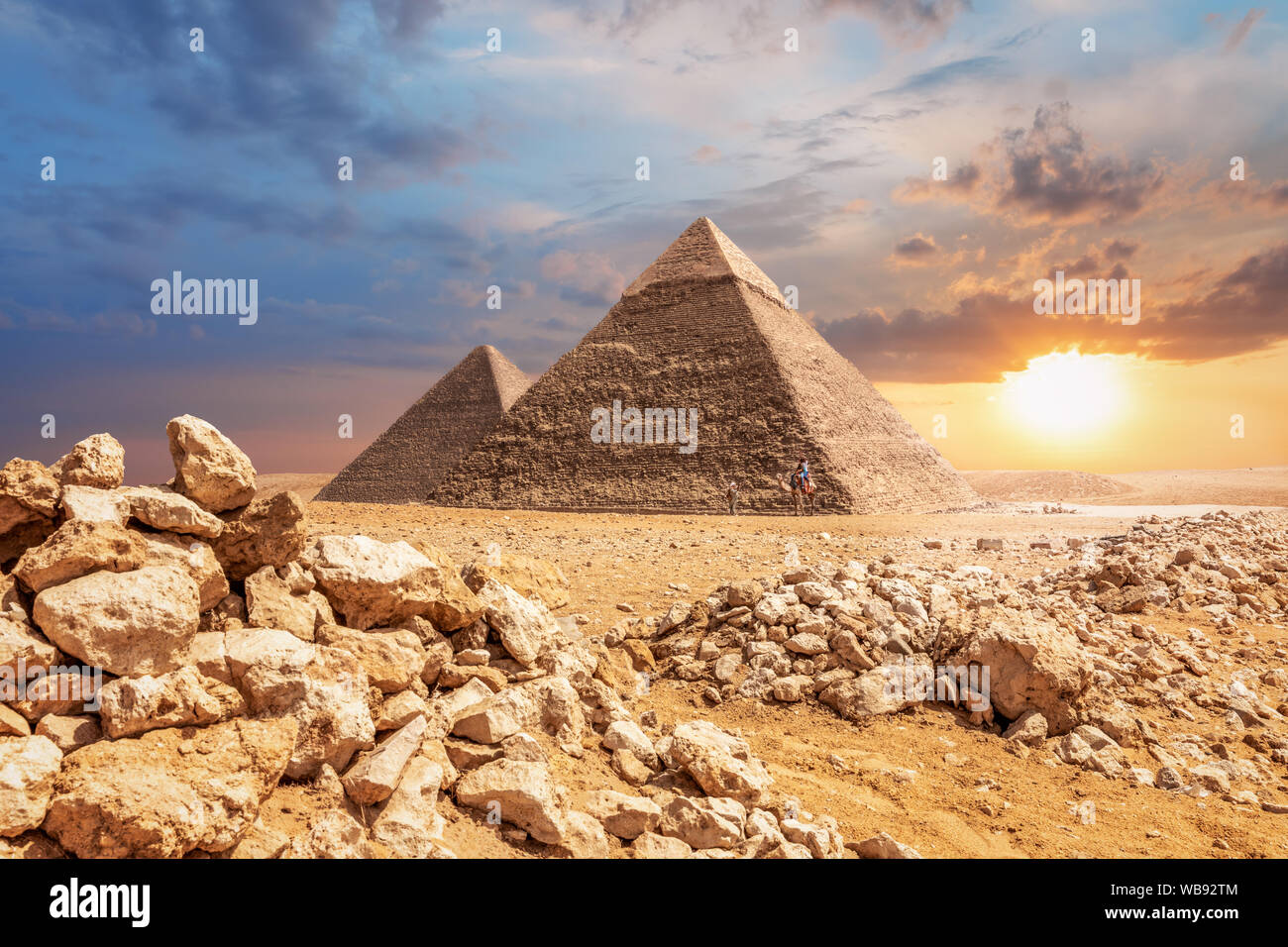Desert sunset, beautiful view of the Pyramids of Giza Stock Photo - Alamy