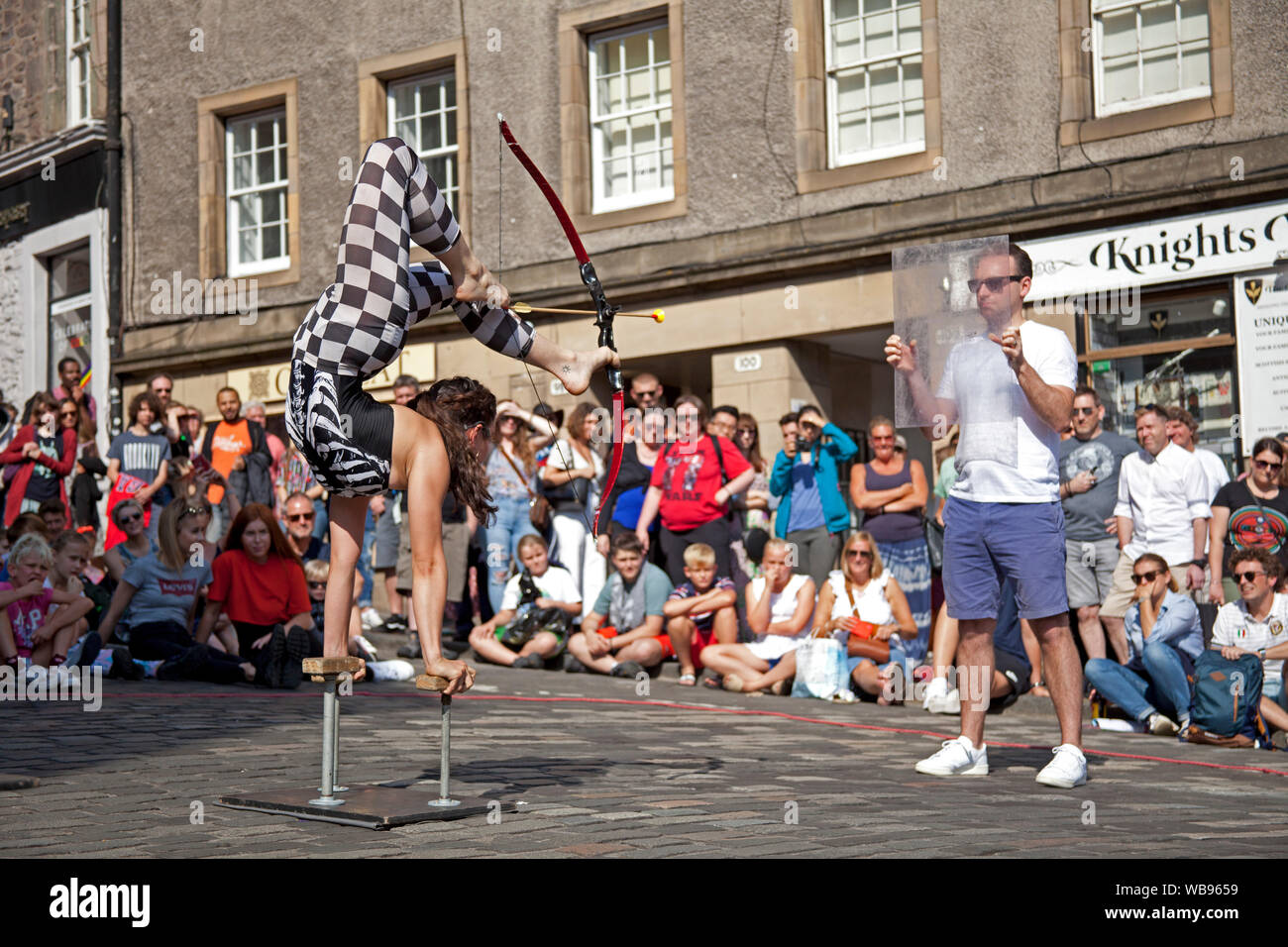 Contortionist in box hi-res stock photography and images - Alamy