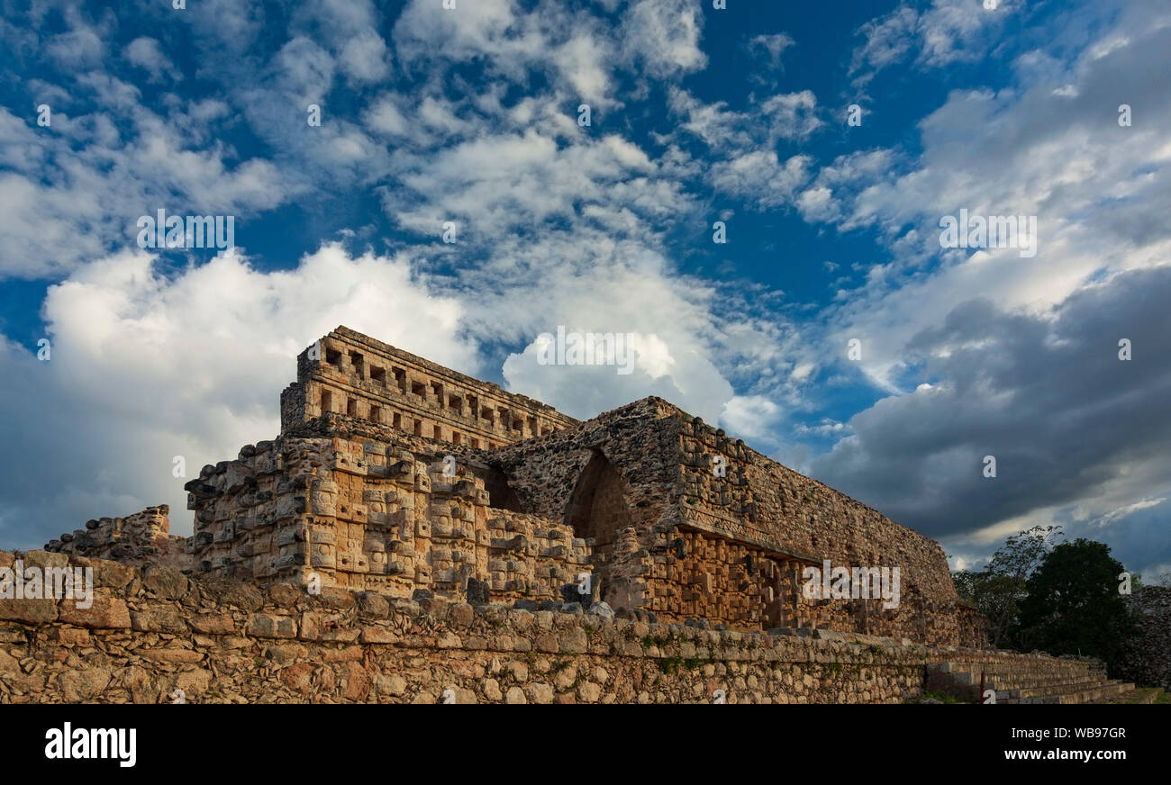 Tha Codz Poop Palace at Kabah covered with masks of the Flower Mountain ...