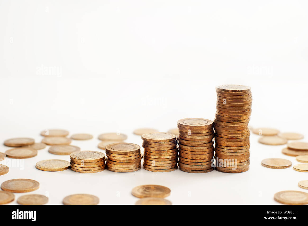 Coin graph on a white background Stock Photo - Alamy