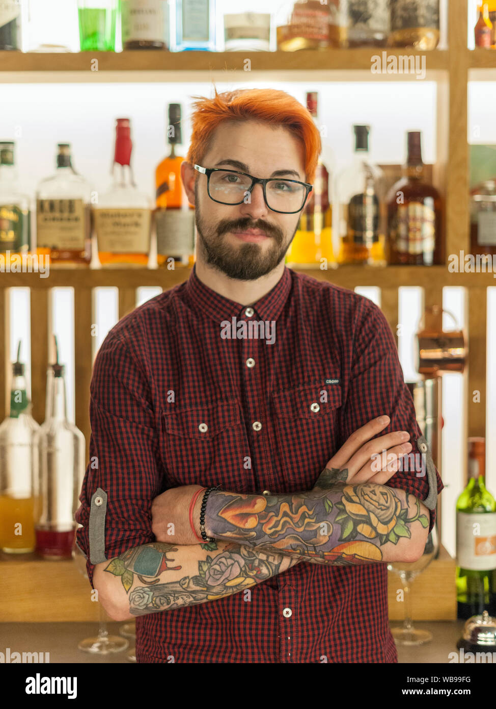 Bar manager arms folded hi-res stock photography and images - Alamy