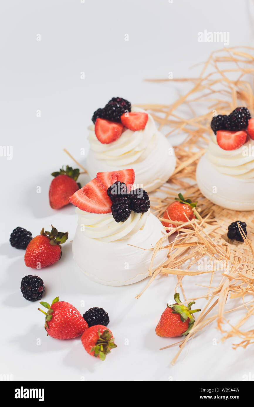 Dessert with berries on a meringue with cream Stock Photo - Alamy