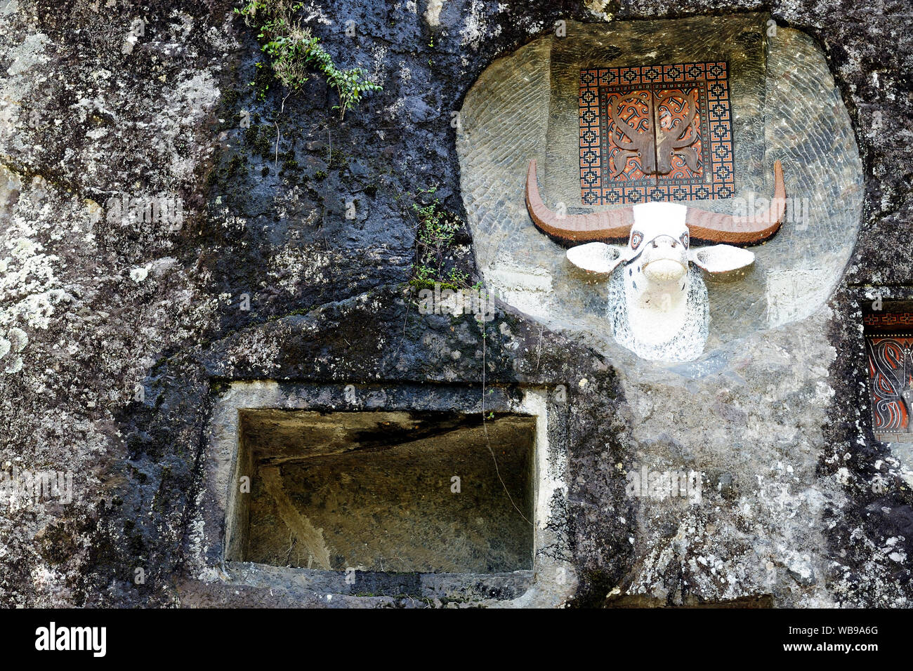 Ancient forged tomb in rock in Indonesia in the Tana Toraja area ...