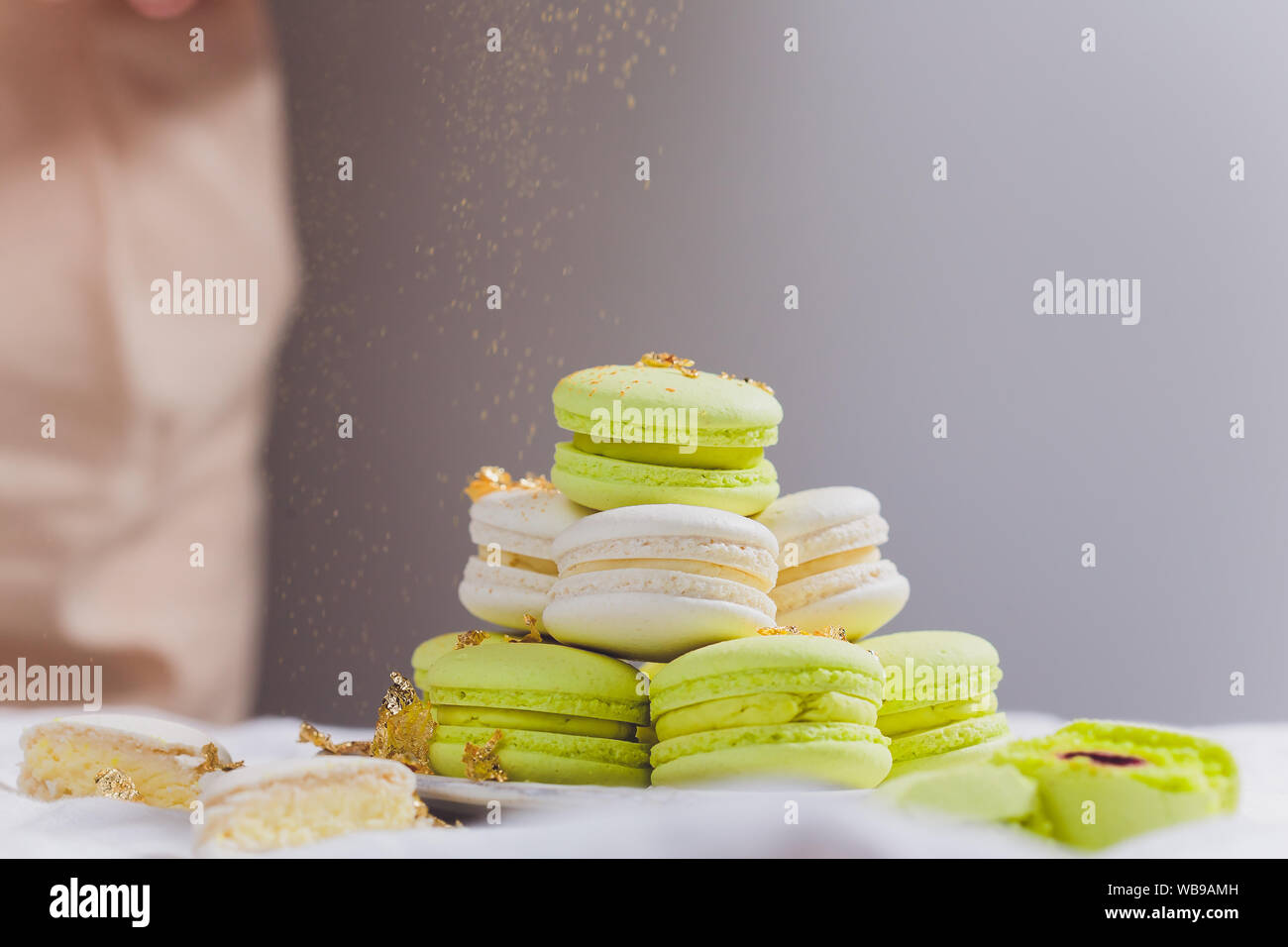Many colorful macaroons on white ceramics plate over the table Stock ...