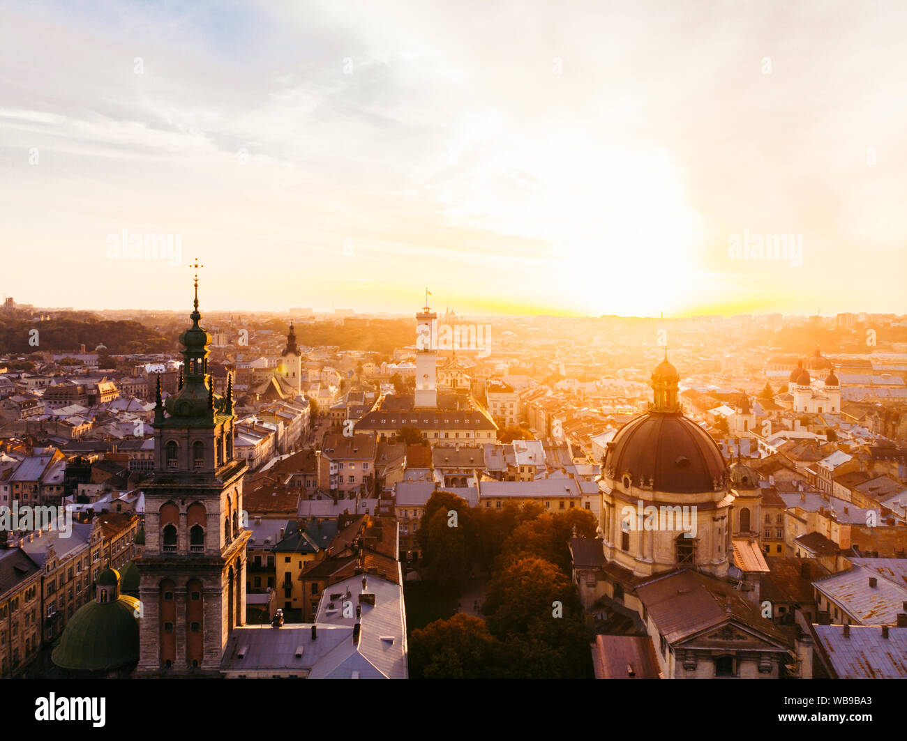 aerial view of sunset above european city Stock Photo - Alamy
