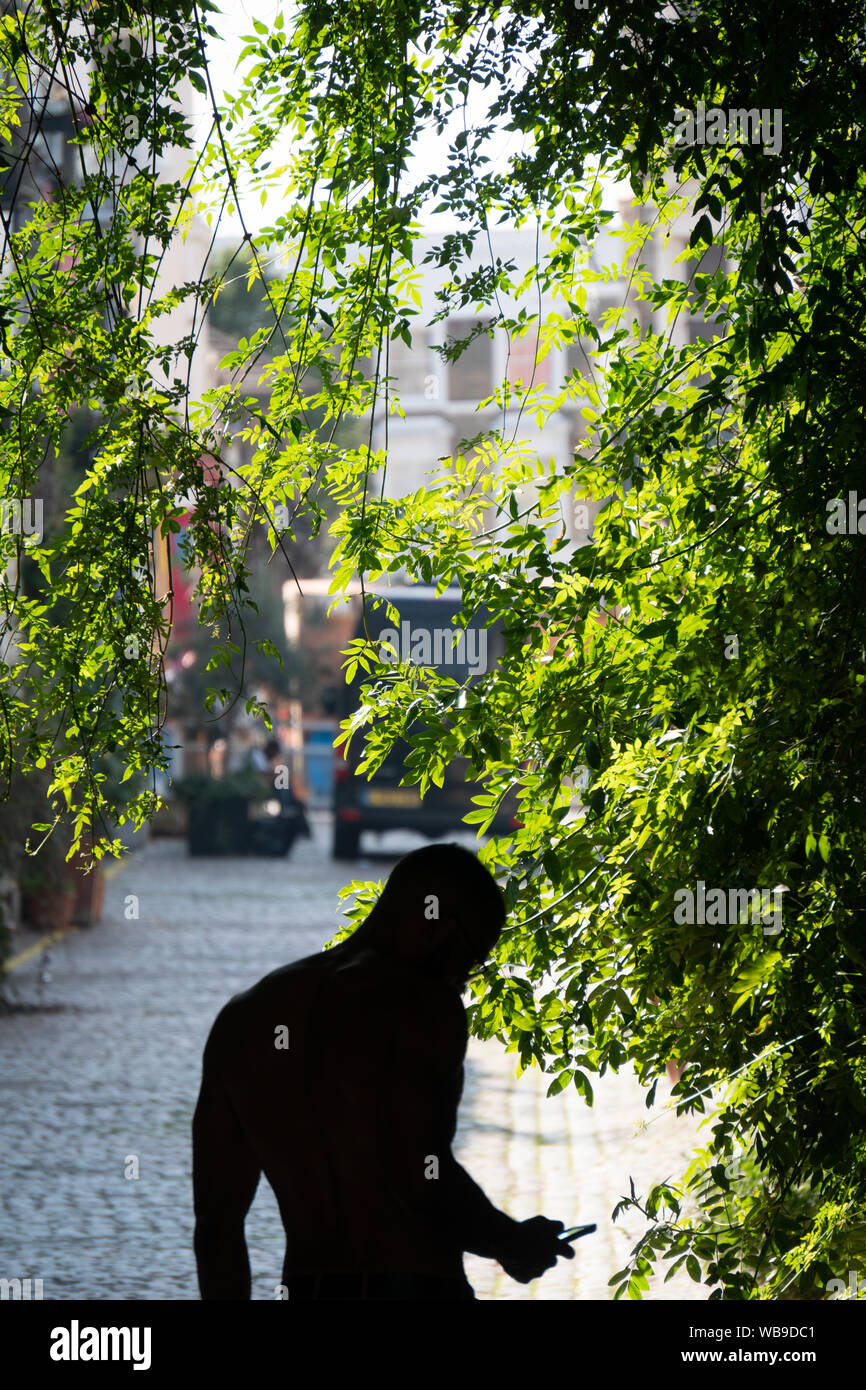Shadow man hiding hi-res stock photography and images - Alamy