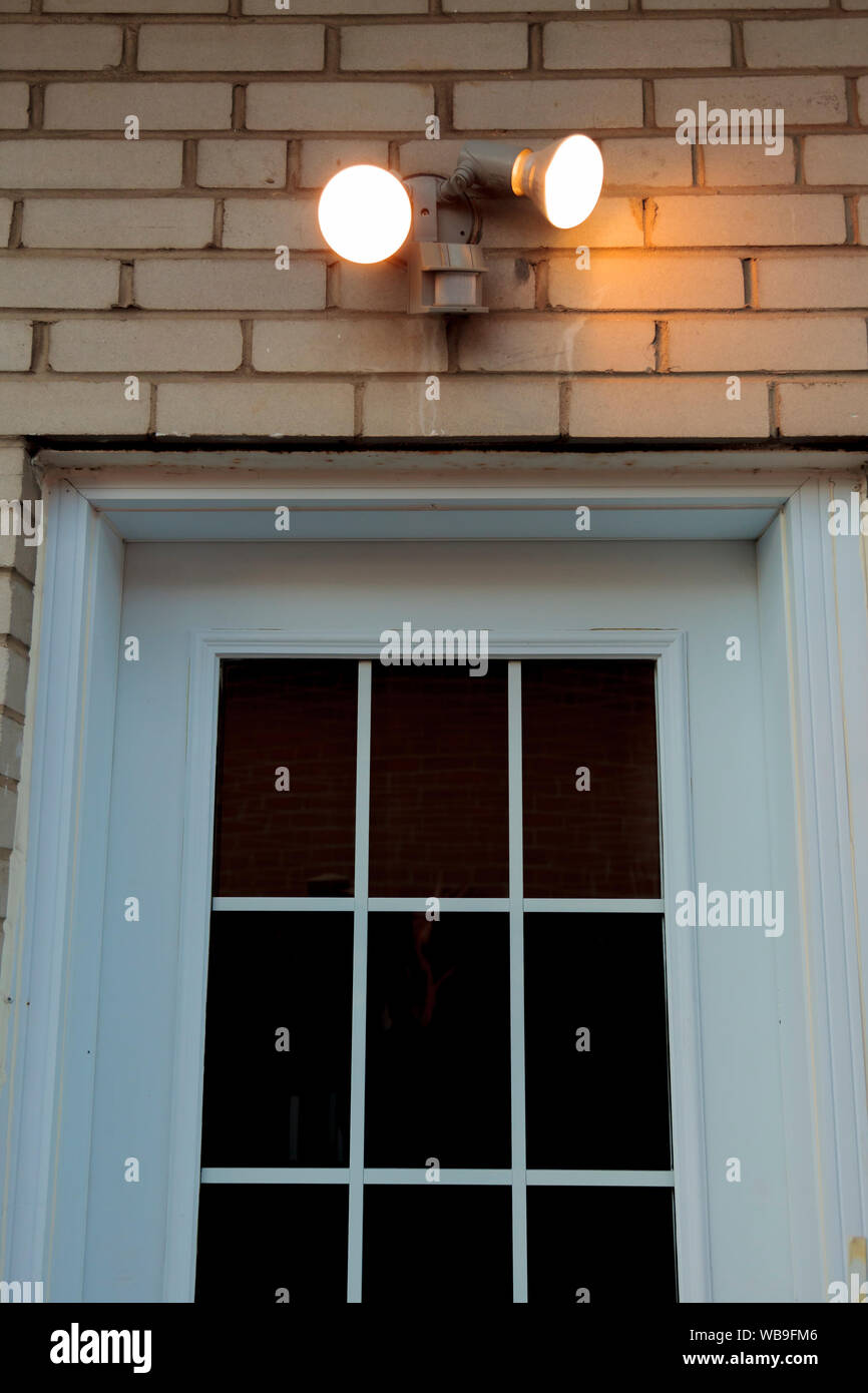 Light sensor bulbs on top of door frame Stock Photo - Alamy