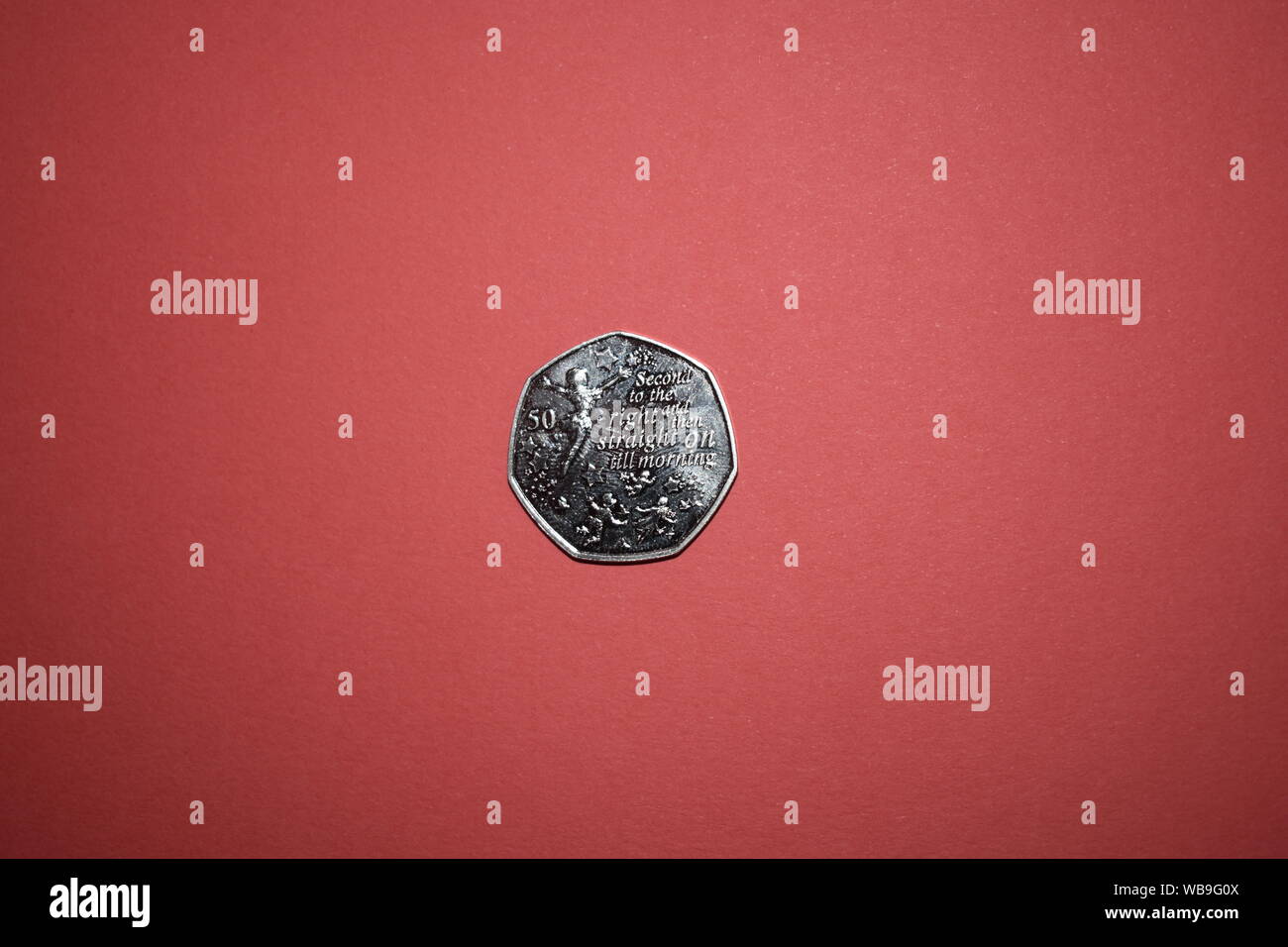 (UC) Peter Pan 50p on a colourful background Stock Photo - Alamy