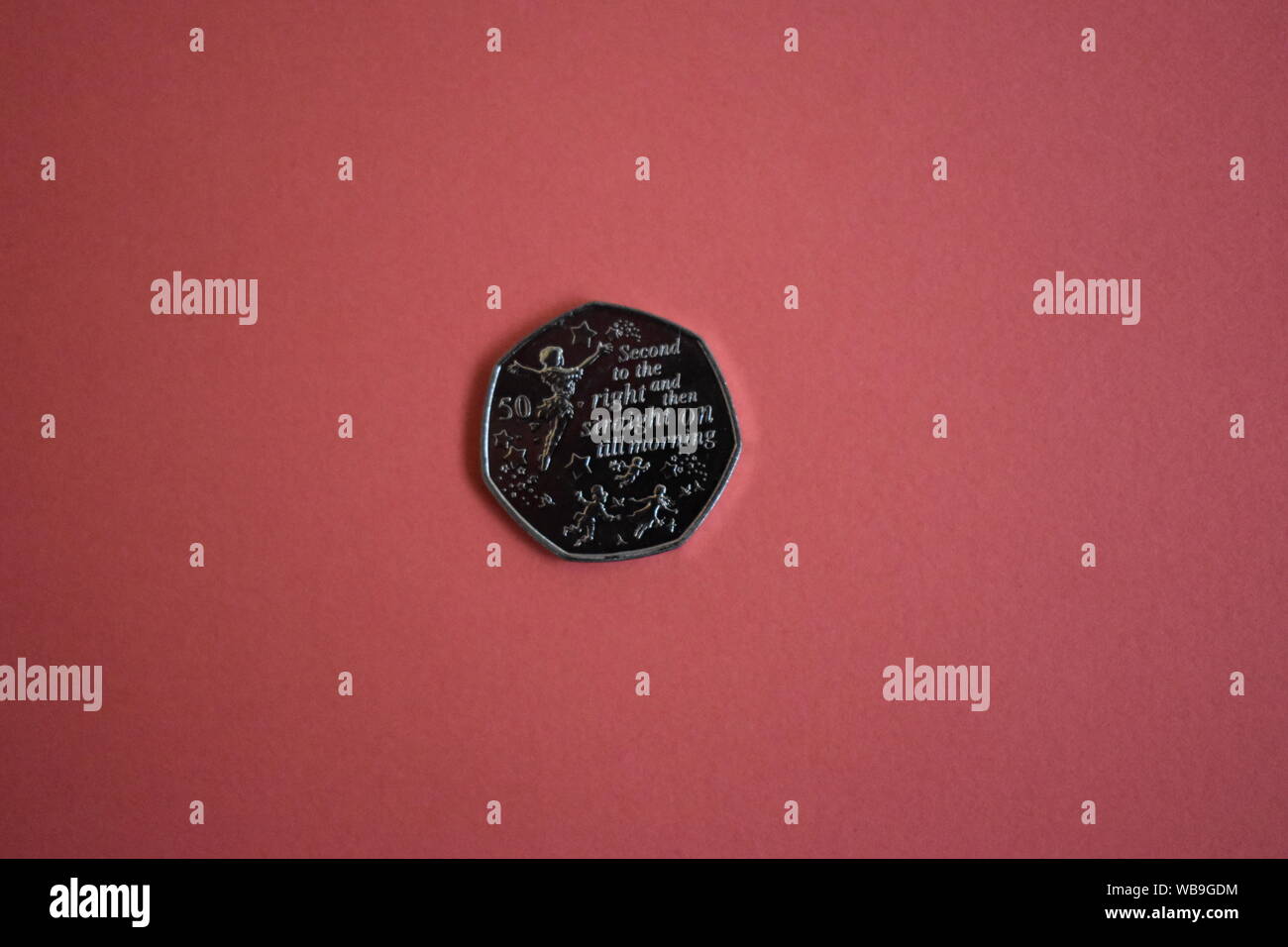 (UC) Peter Pan 50p on a colourful background Stock Photo - Alamy