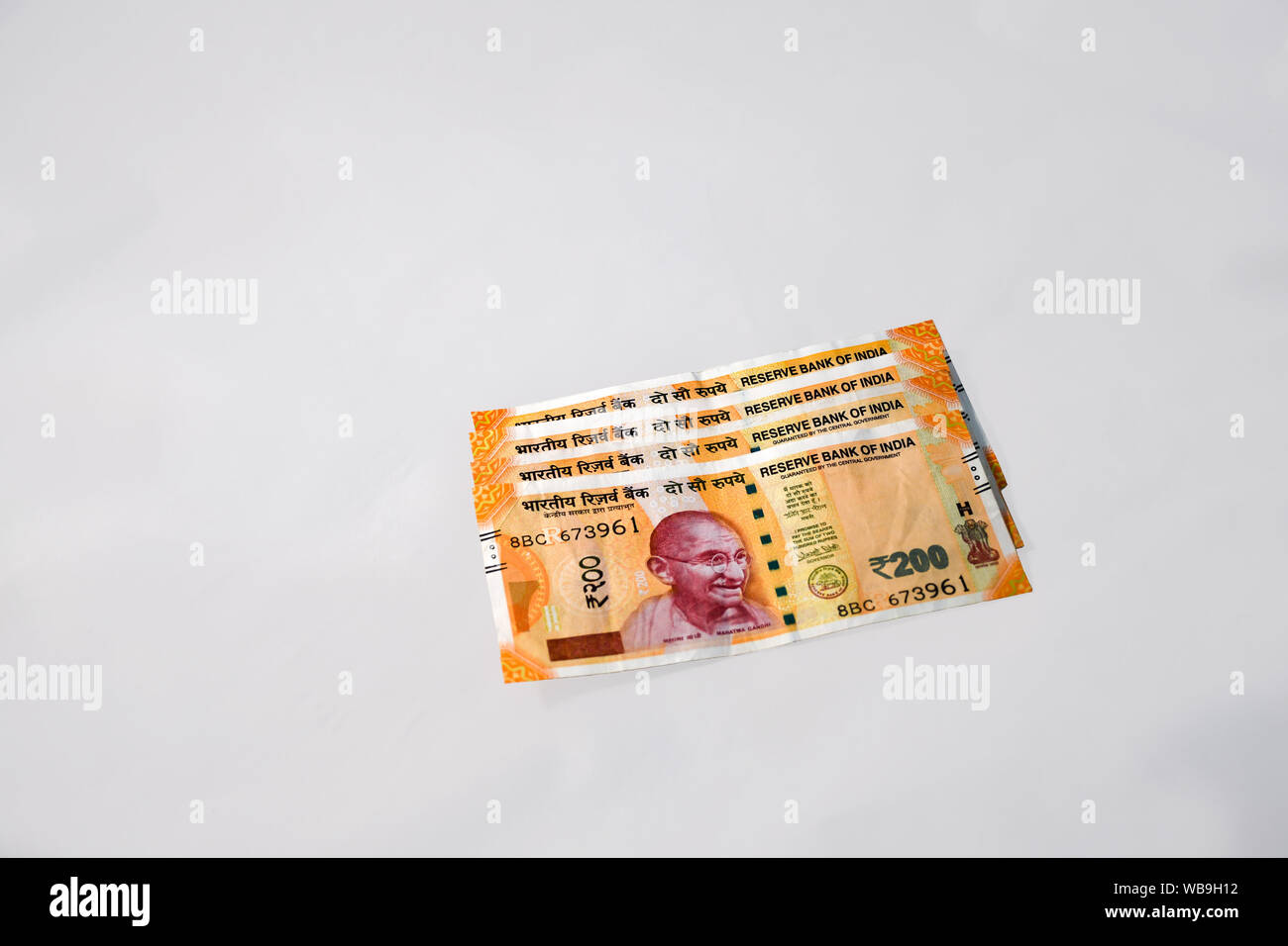 Modern Indian Two Hundred Rupees Currency Notes on a minimal grey ...