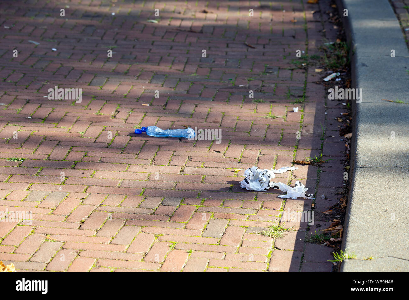 Used plastic left as a garbage on the street, Waste pollution ...