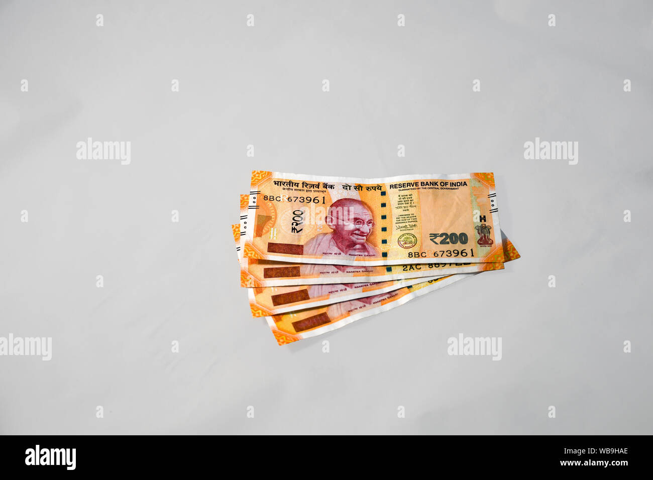 Modern Indian Two Hundred Rupees Currency Notes on a minimal grey ...