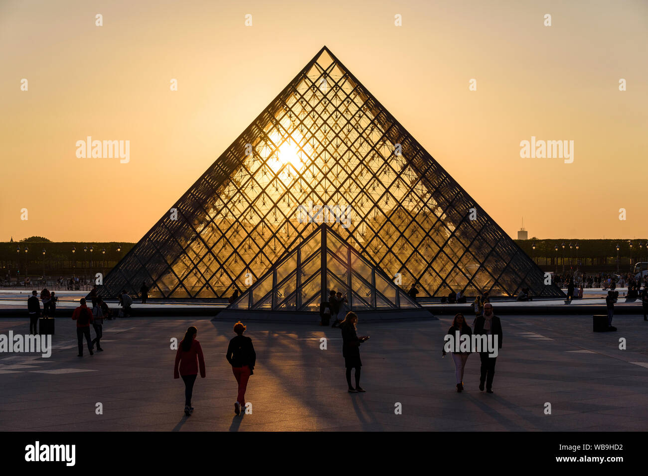 Louvre pyramid sunset hi-res stock photography and images - Alamy