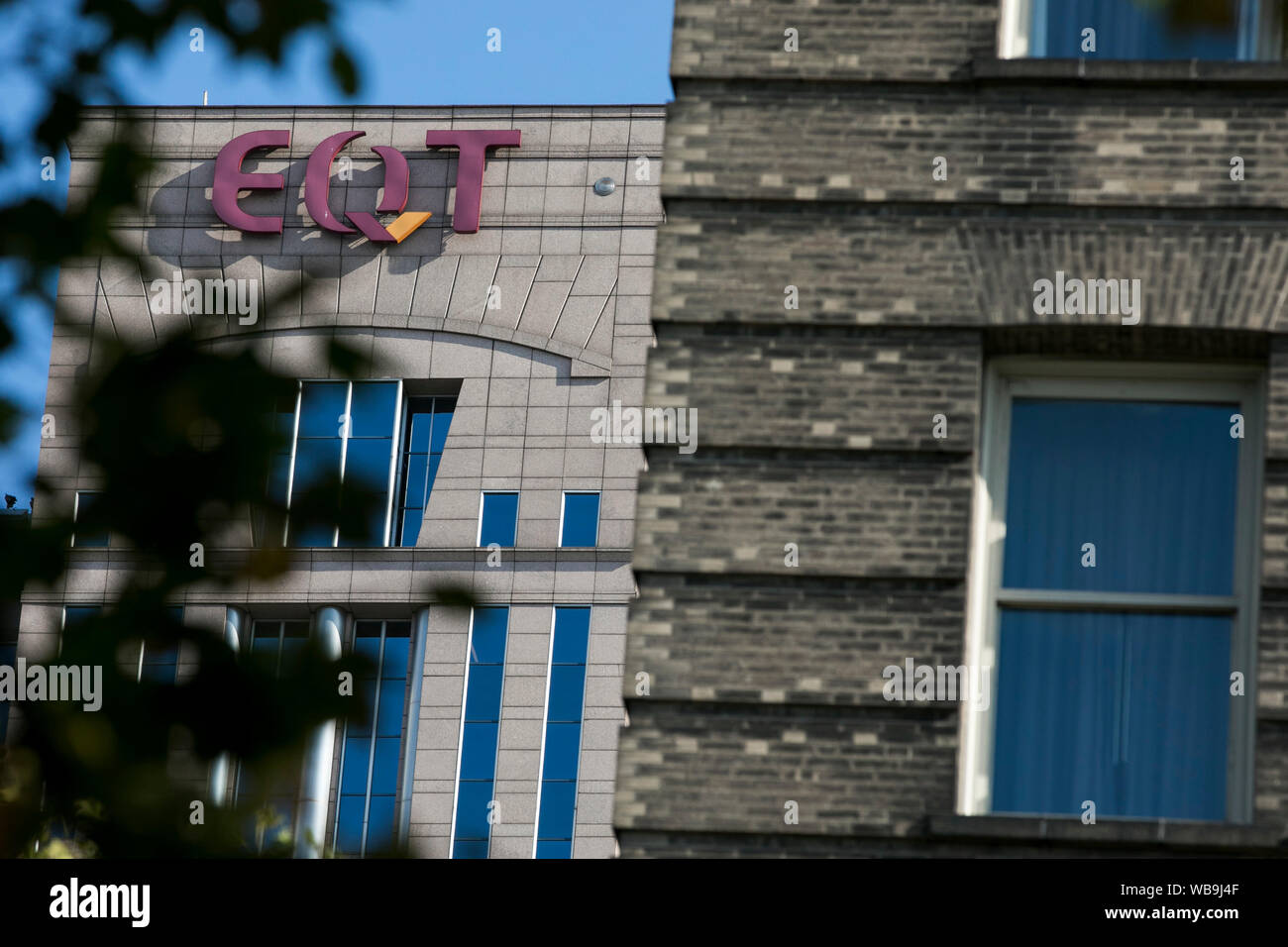 A logo sign outside of the headquarters of the EQT Corporation in ...