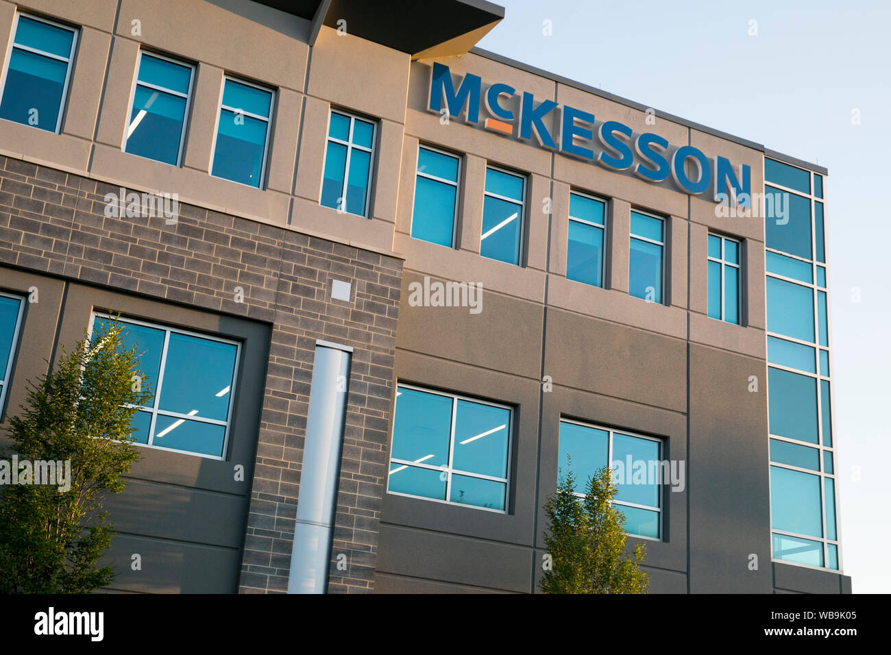 A logo sign outside of a facility occupied by the McKesson Corporation ...