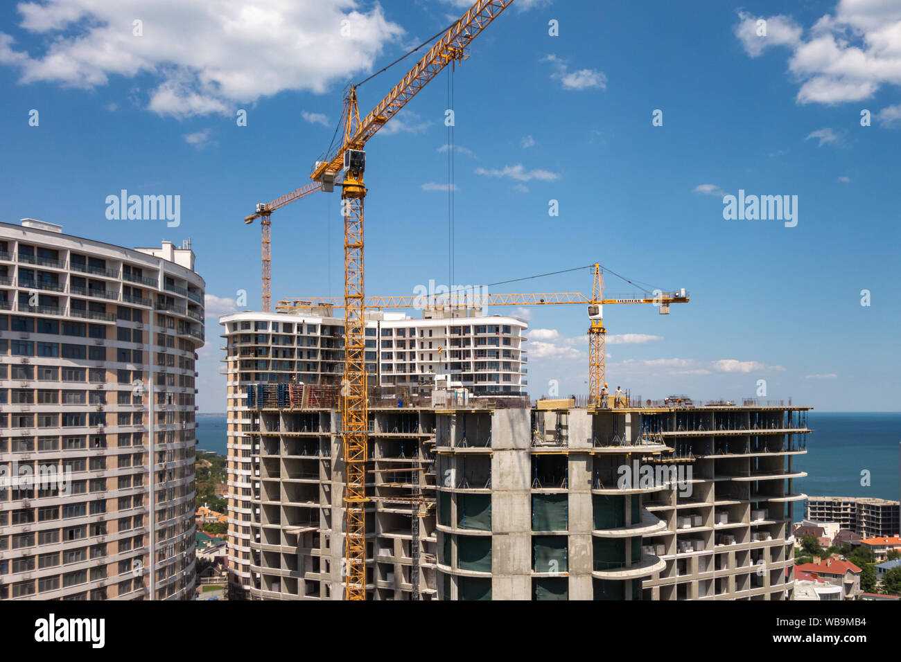 The construction of a high-rise apartment building on the seashore ...