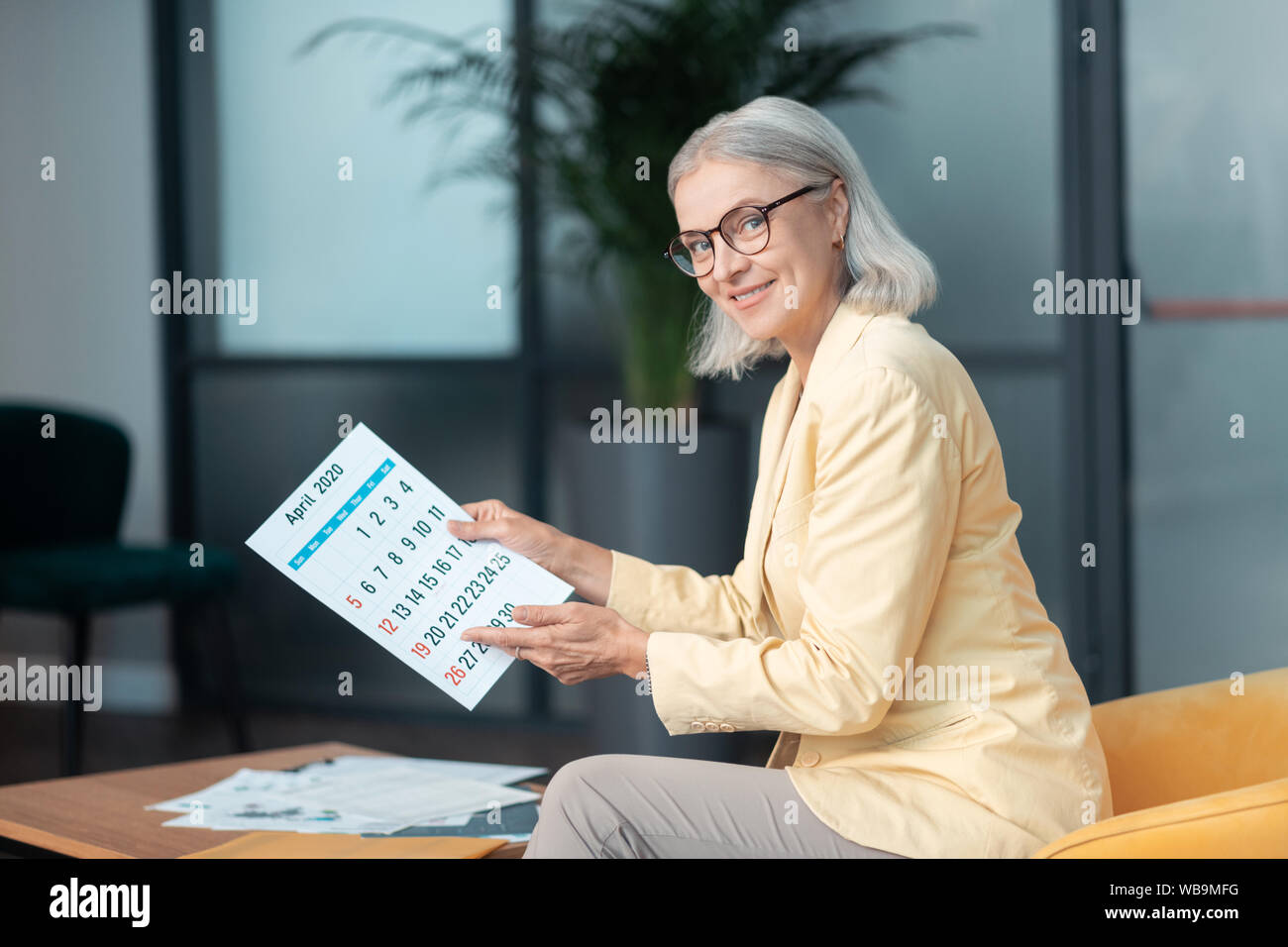 Mature woman alone calendar hi-res stock photography and images - Alamy