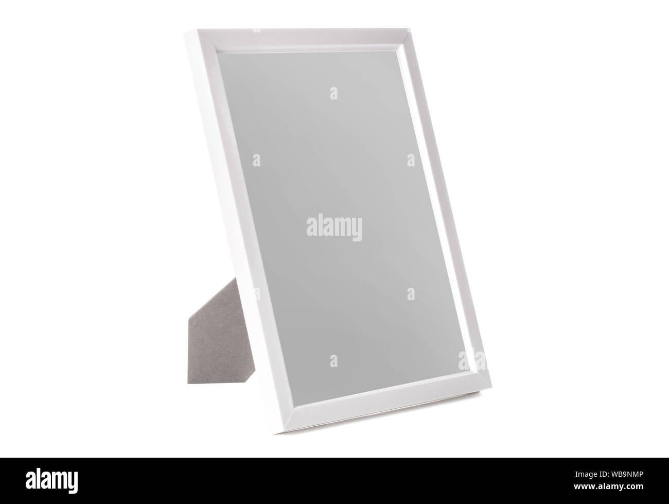 White desktop photo frame at an angle isolated on white background ...