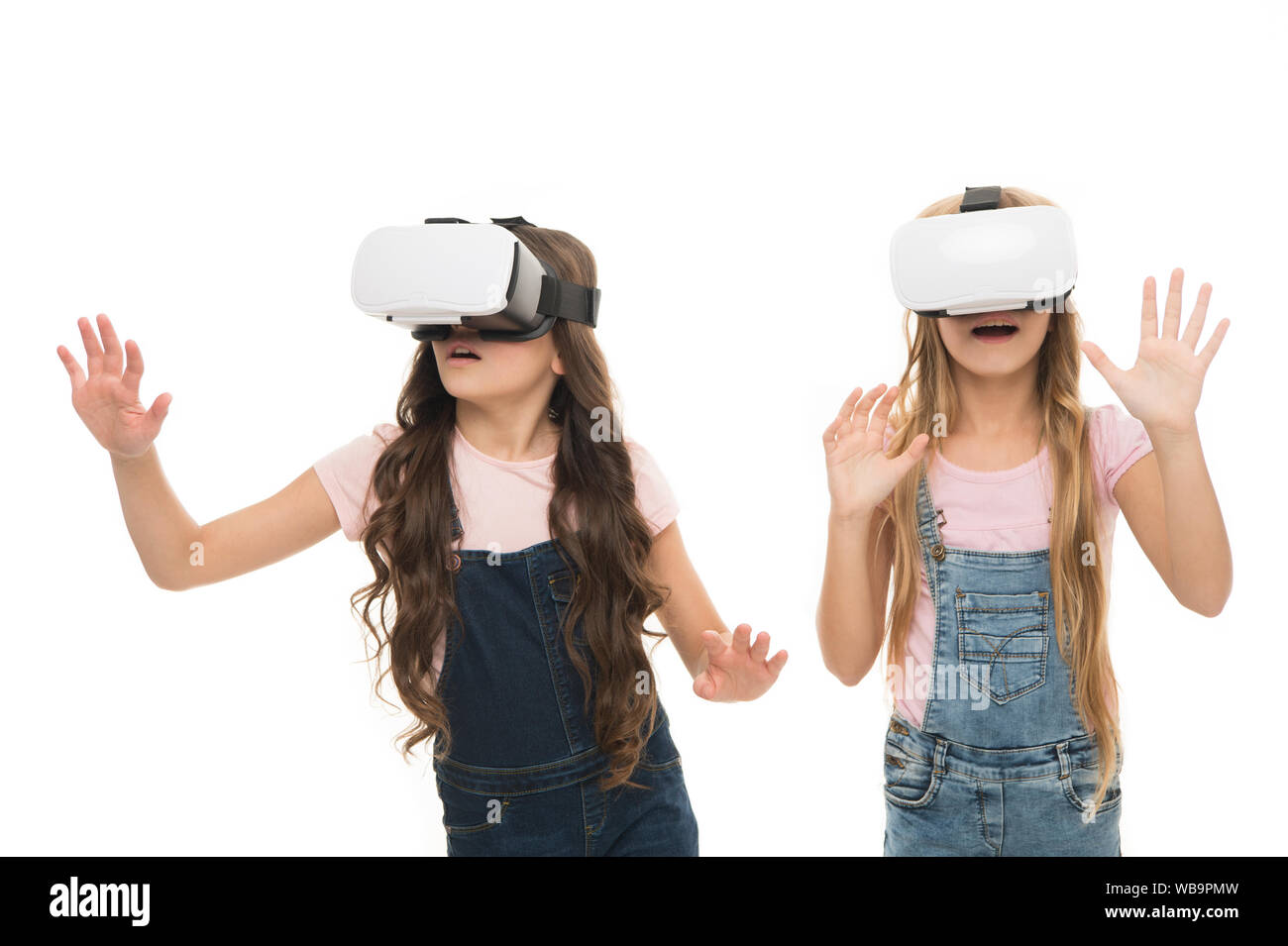 Augmented reality technology. Virtual reality is exciting. Girls little ...