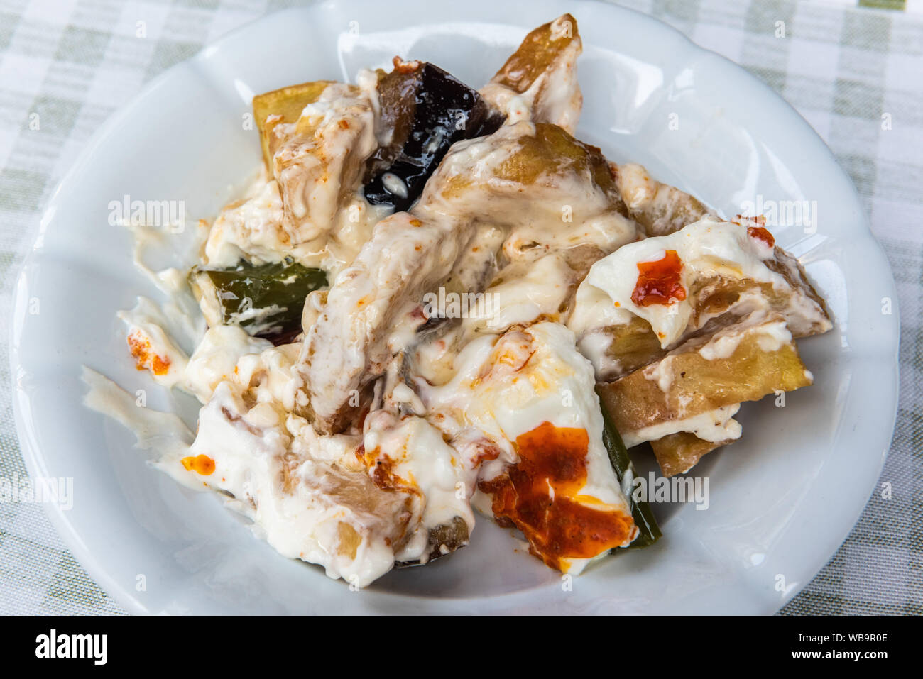 Turkish dish of cooked vegetables with yoghurt Stock Photo - Alamy