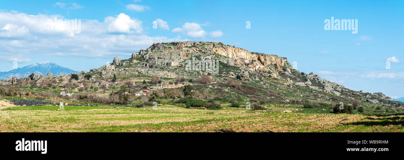 Rocky plateau with scattered ruins of Silyon ancient city in Antalya ...