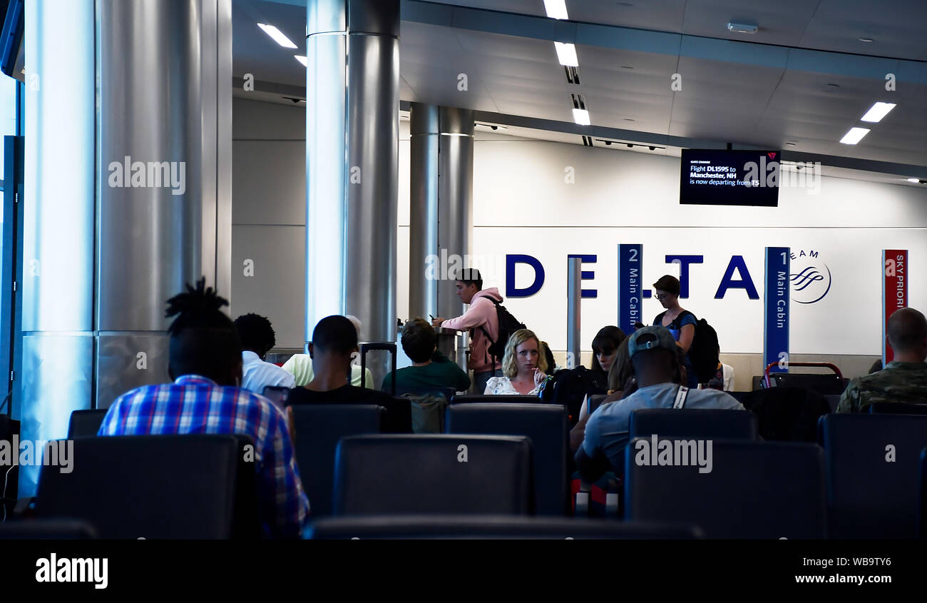 People waiting in airport gate terminal at Hartsfield–Jackson Atlanta ...