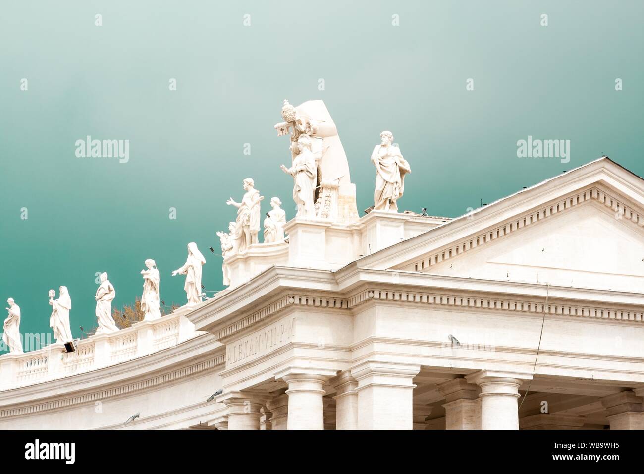 Rooftop of an old Roman temple with statues on top Stock Photo - Alamy
