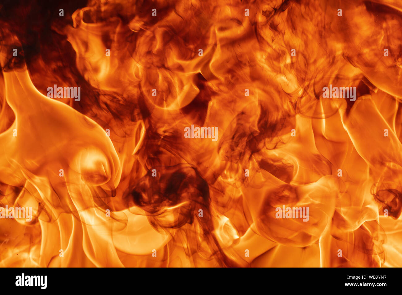 Abstract red fire natural texture with blaze. Beautiful dangerous ...