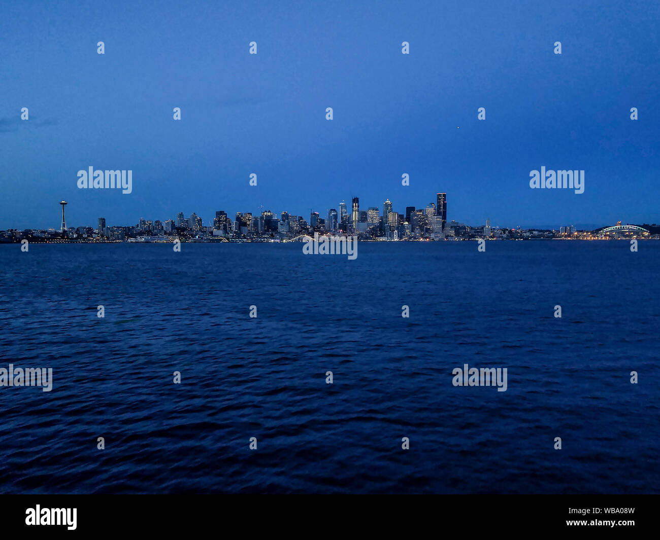 Early evening view of downtown Seattle from an incoming ferry with the ...