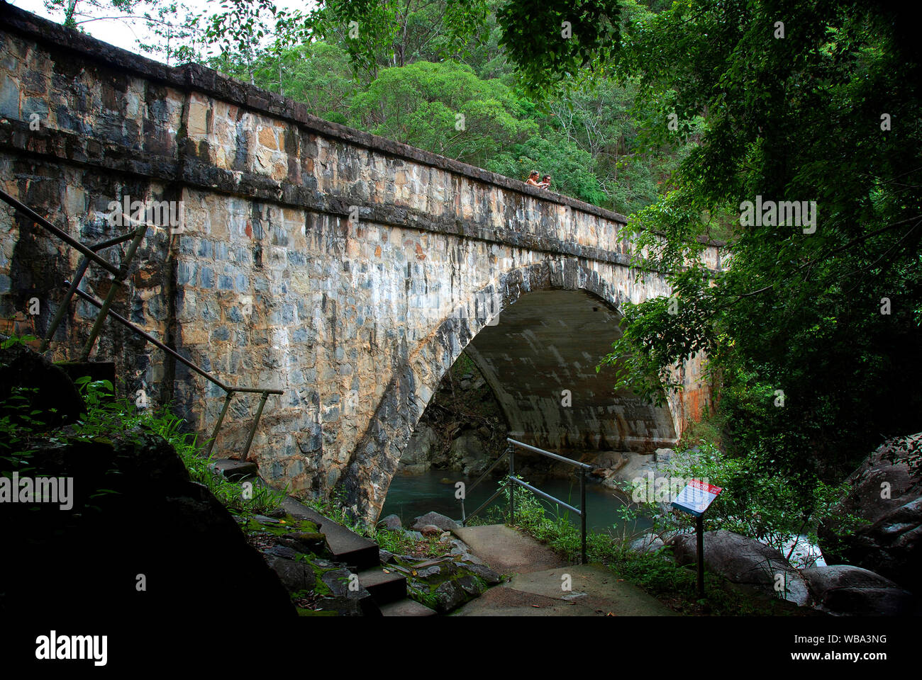 Stone Roman arch bridge, built over Little Crystal Creek, Paluma Range ...