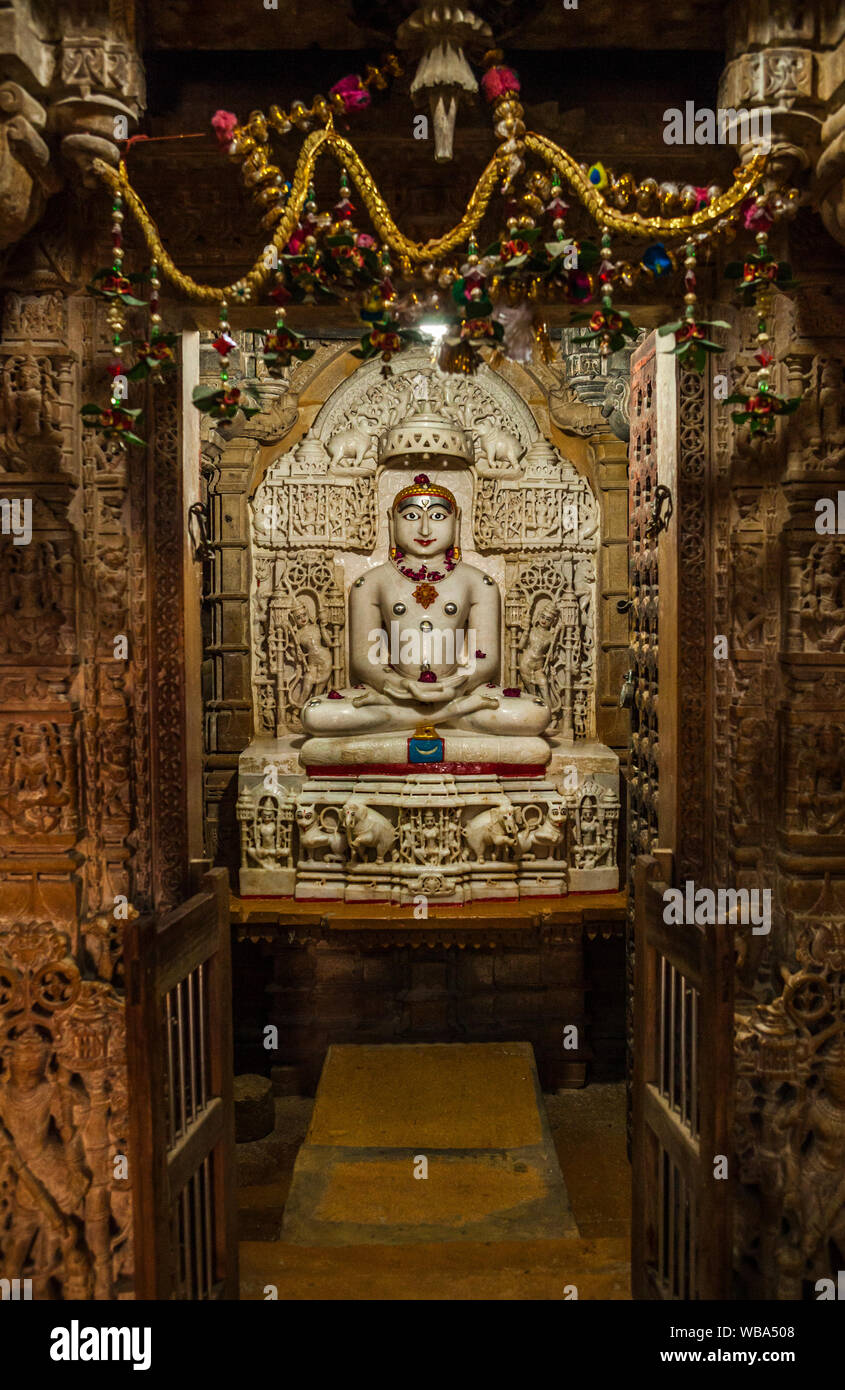 Beautifully carved image of Rishabdev in a Jain temple within Jaisalmer ...