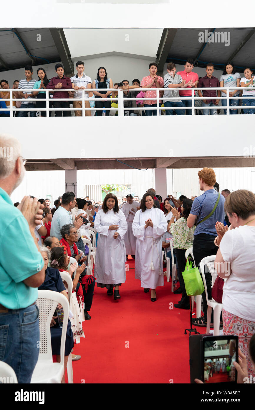 Central American male and female Lutheran seminarians in white ...