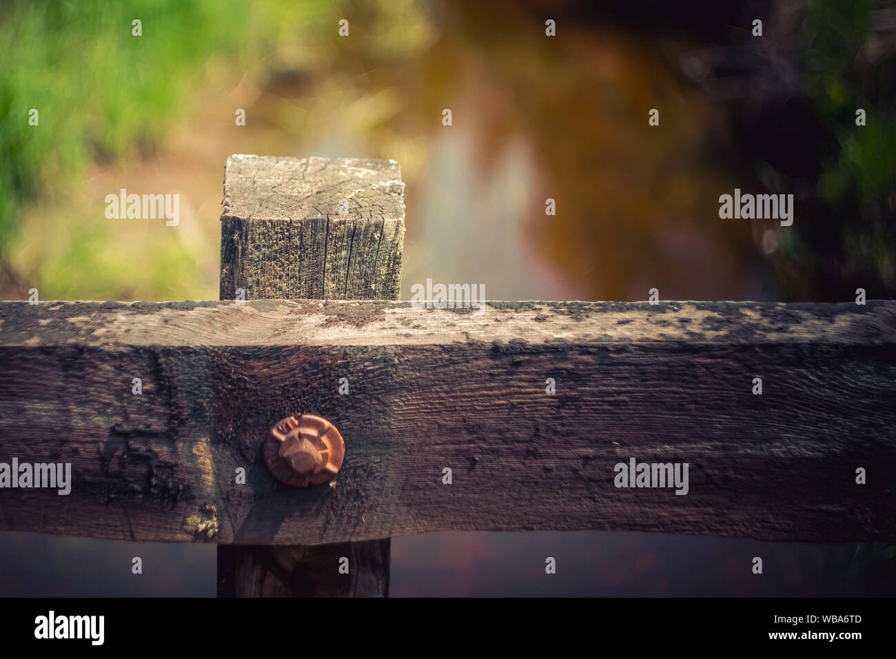 Wooden Bridge Over Stream Stock Photo - Alamy