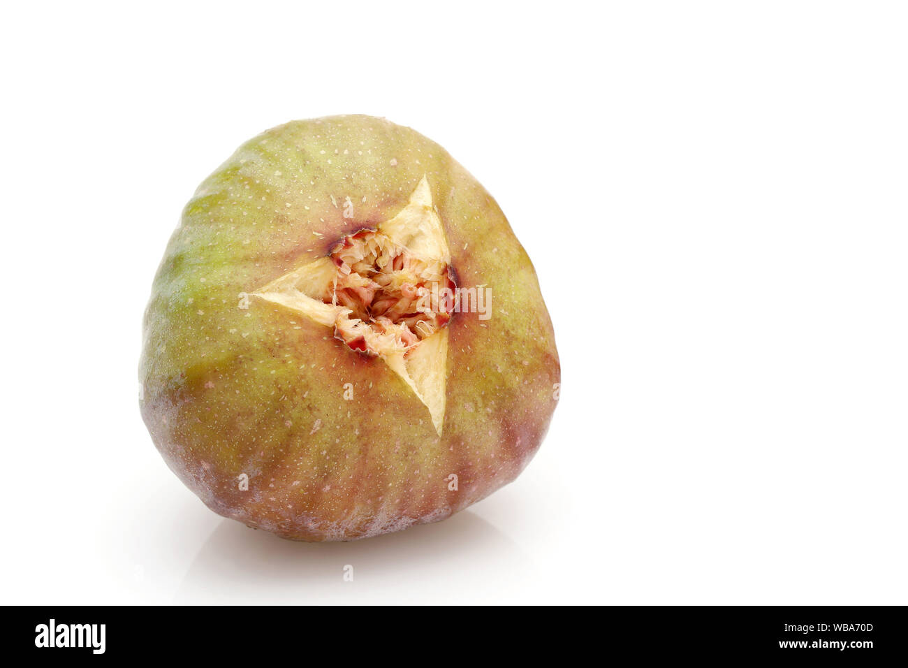 Ripe sweet fig isolated on a white background Stock Photo - Alamy