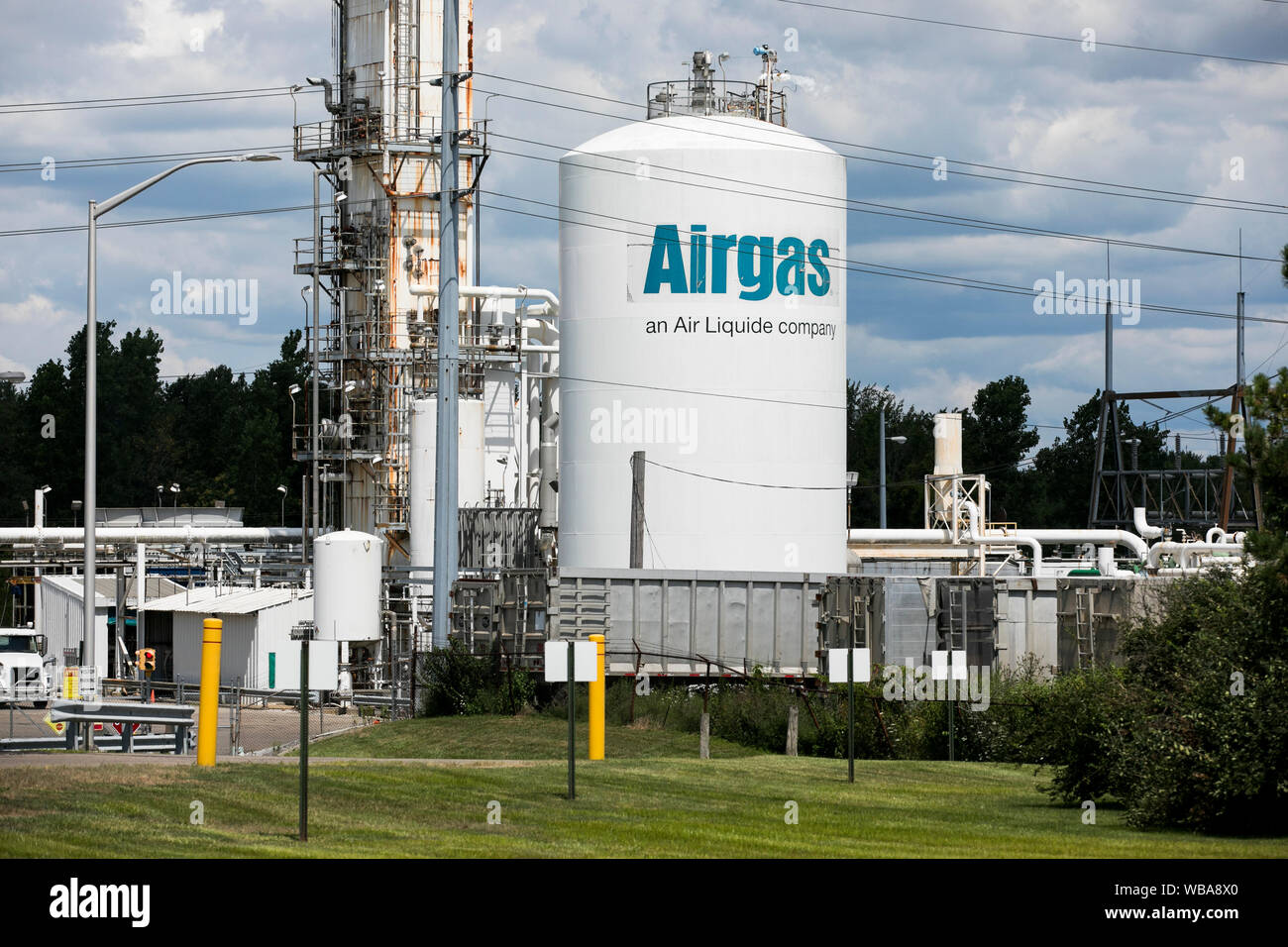 A logo sign outside of a facility occupied by Airgas in Canton, Ohio on ...