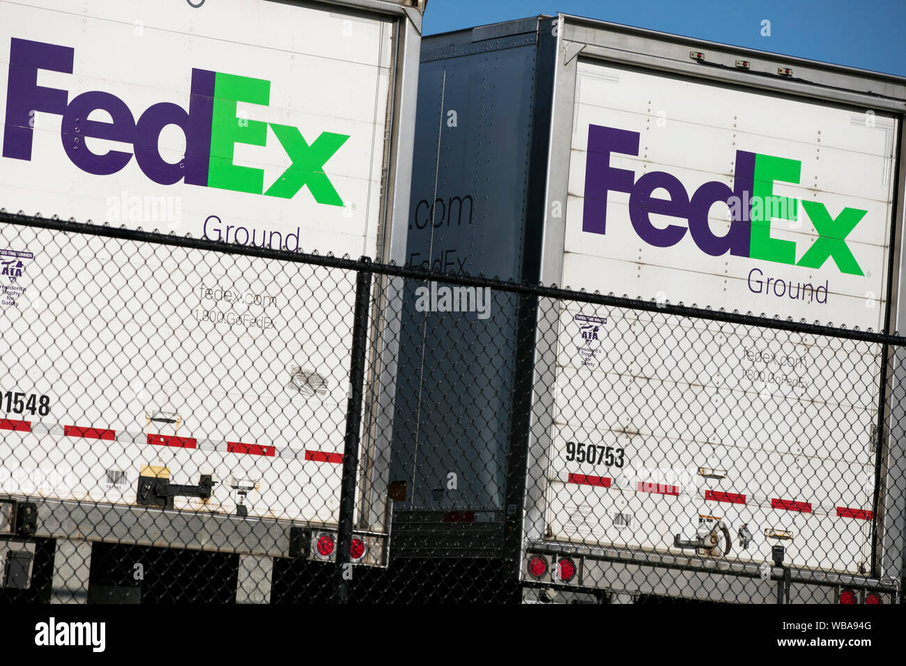 FedEx Ground logos on truck trailers at a FedEx distribution center in Twinsburg, Ohio on August ...