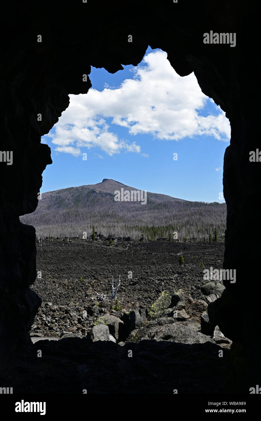 View of lava fields and volcanoes framed in windows of Dee Wright ...
