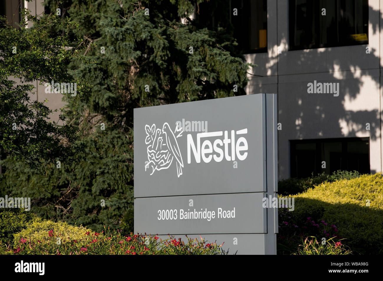 A logo sign outside of a facility occupied by Nestle in Solon, Ohio on ...