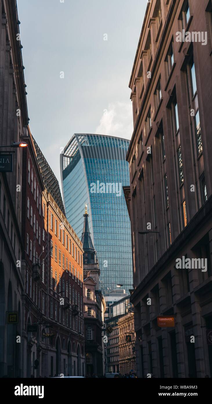 Vertical shot of the Walkie Talkie Tower among buildings in London ...