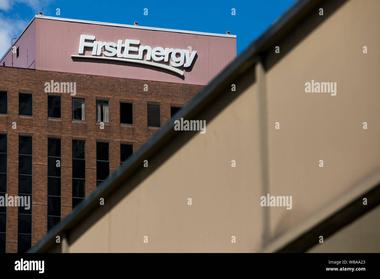 A logo sign outside of the headquarters of FirstEnergy in Akron, Ohio ...