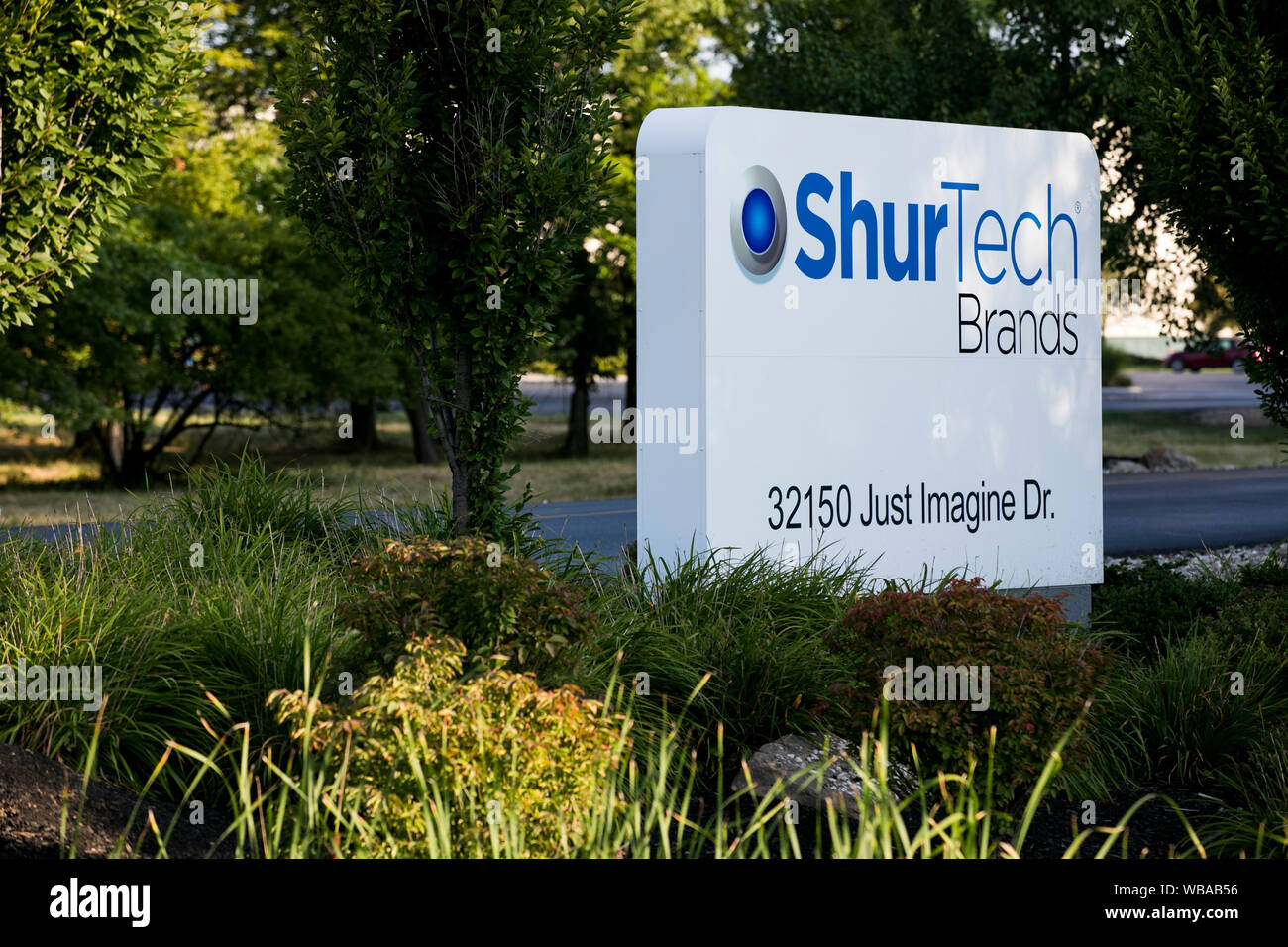 A logo sign outside of the headquarters of ShurTech Brands, maker of ...