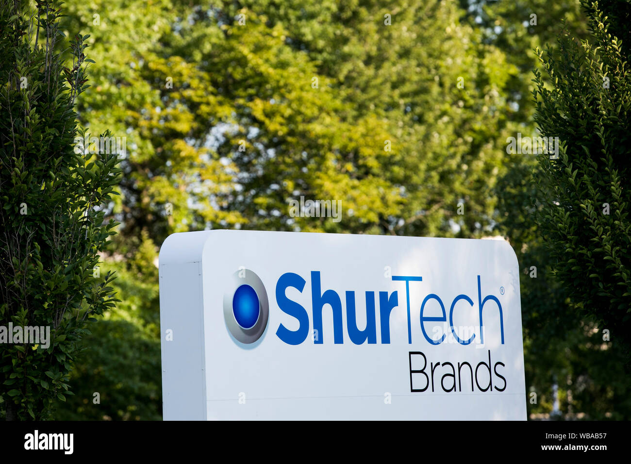 A logo sign outside of the headquarters of ShurTech Brands, maker of ...