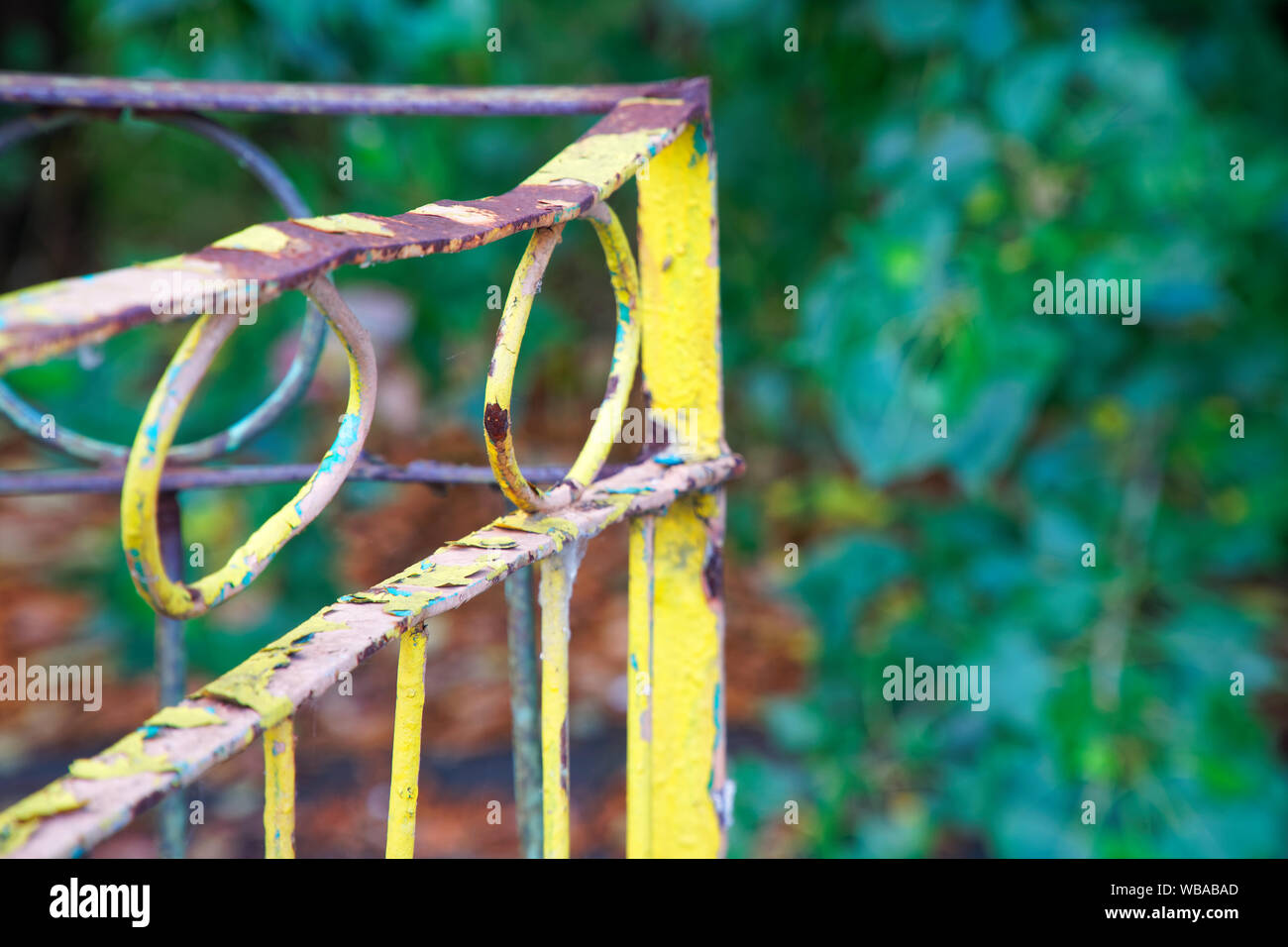 Rusty iron fence with damaged steel circles Stock Photo - Alamy