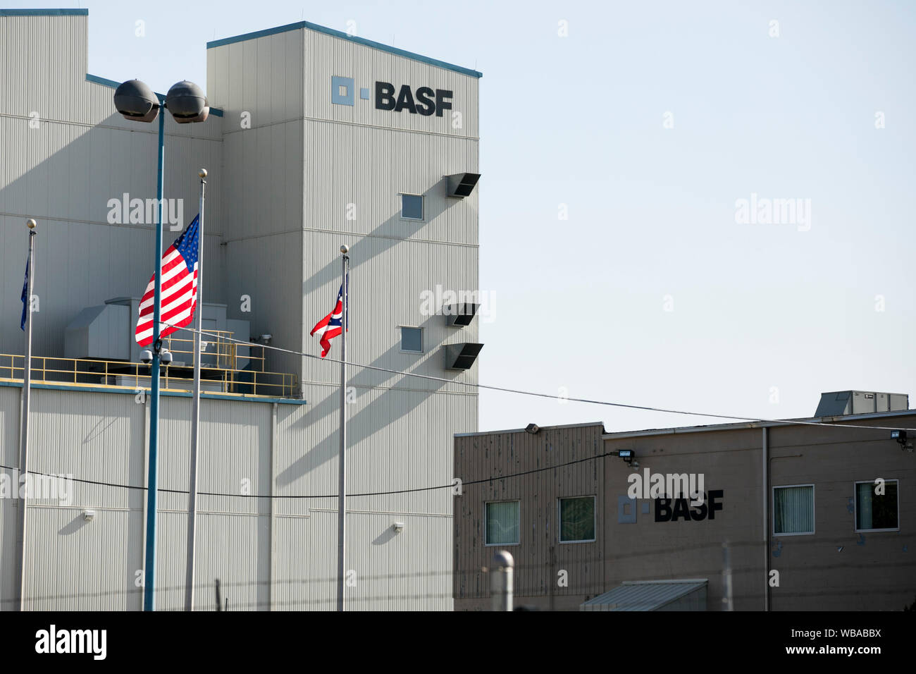 A logo sign outside of a facility occupied by BASF in Elyria, Ohio on ...