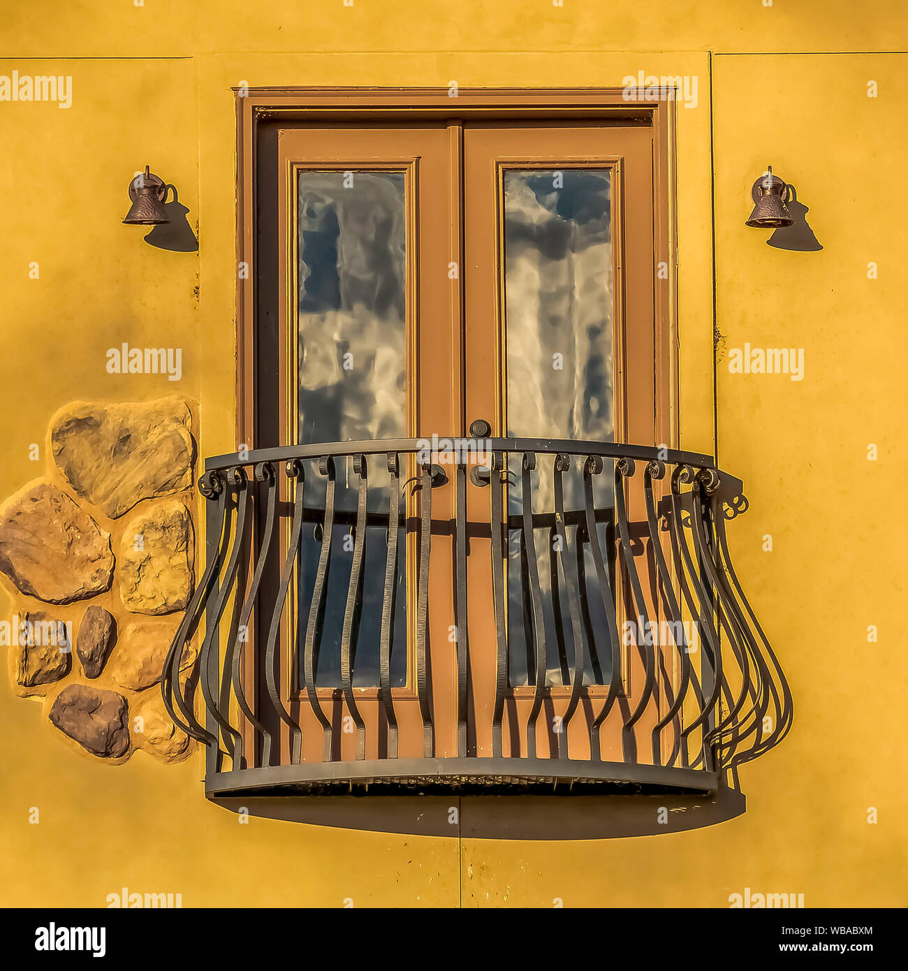 Square frame Close up of the half circular balcony of a home with ...