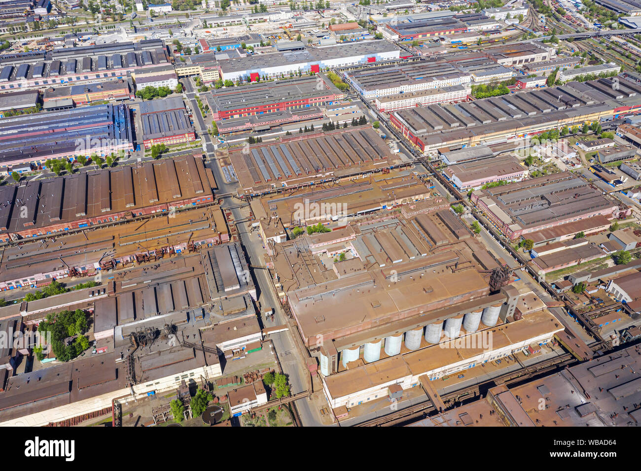 roofs of industrial buildings, aerial view. city industrial park ...